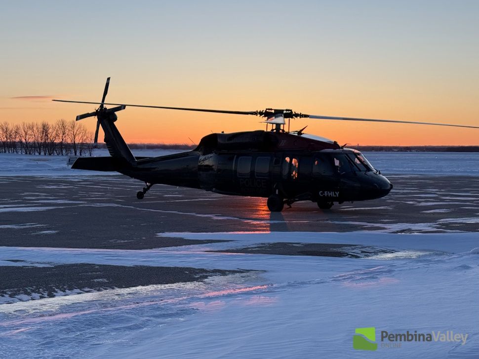 Local aviation enthusiast spotlights RCMP helicopter landing at Morden ...