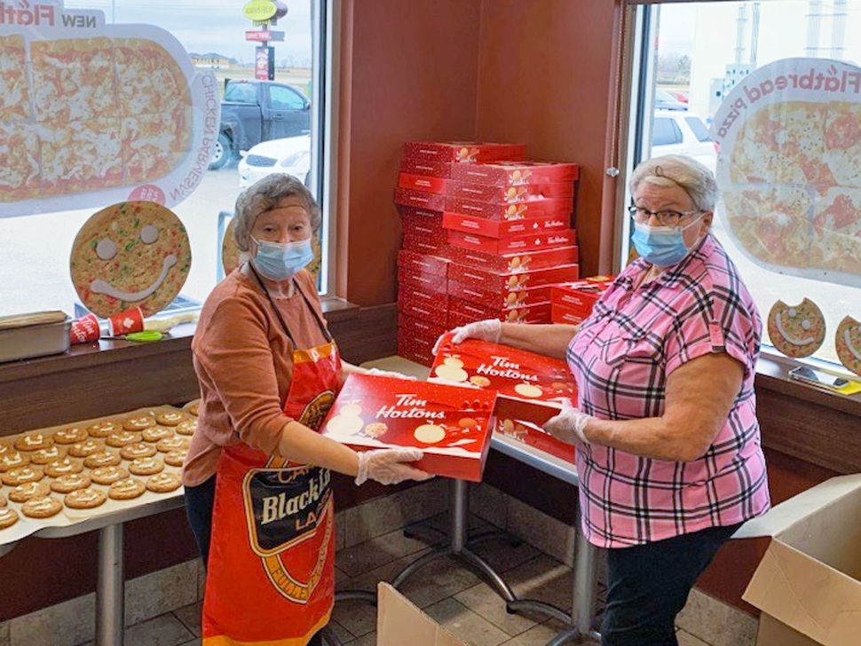 Niverville Food Bank gets help from Tim Horton's Holiday Smile Cookie ...