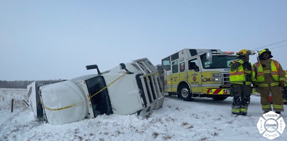 Transport truck rolls on icy Airdrie road; fire crews respond to ...