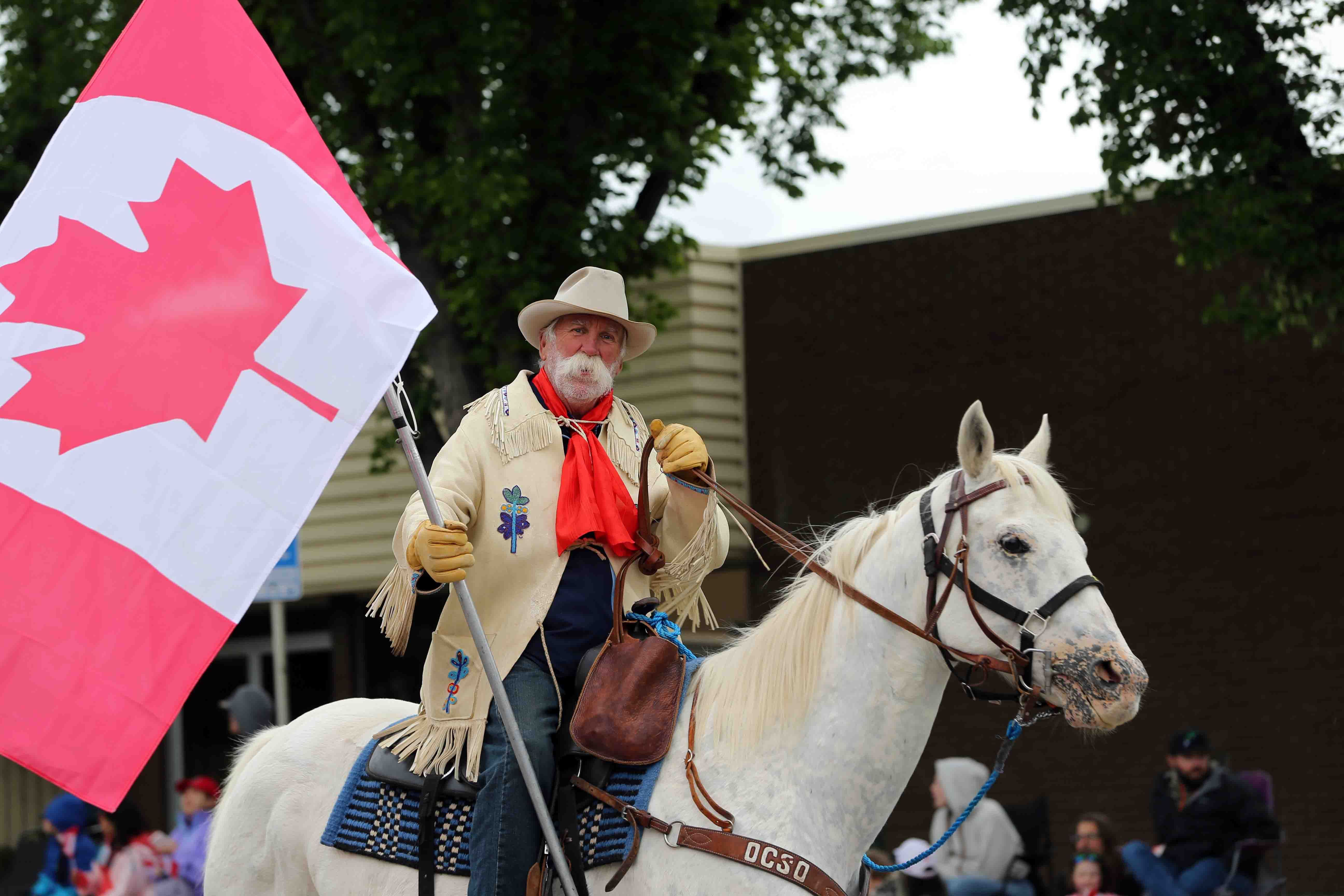 Watch / Gallery: Rain can't dampen Airdrie's Canada Day Parade ...