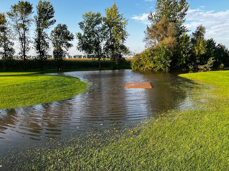 Flooded fairways and bunkers keep Portage golfers off the greens ...