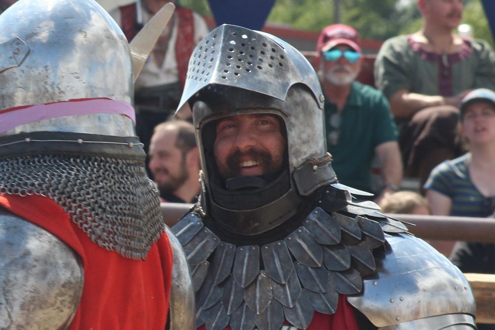 Swords smash shields during medieval combat demo at Strathmore Ag ...