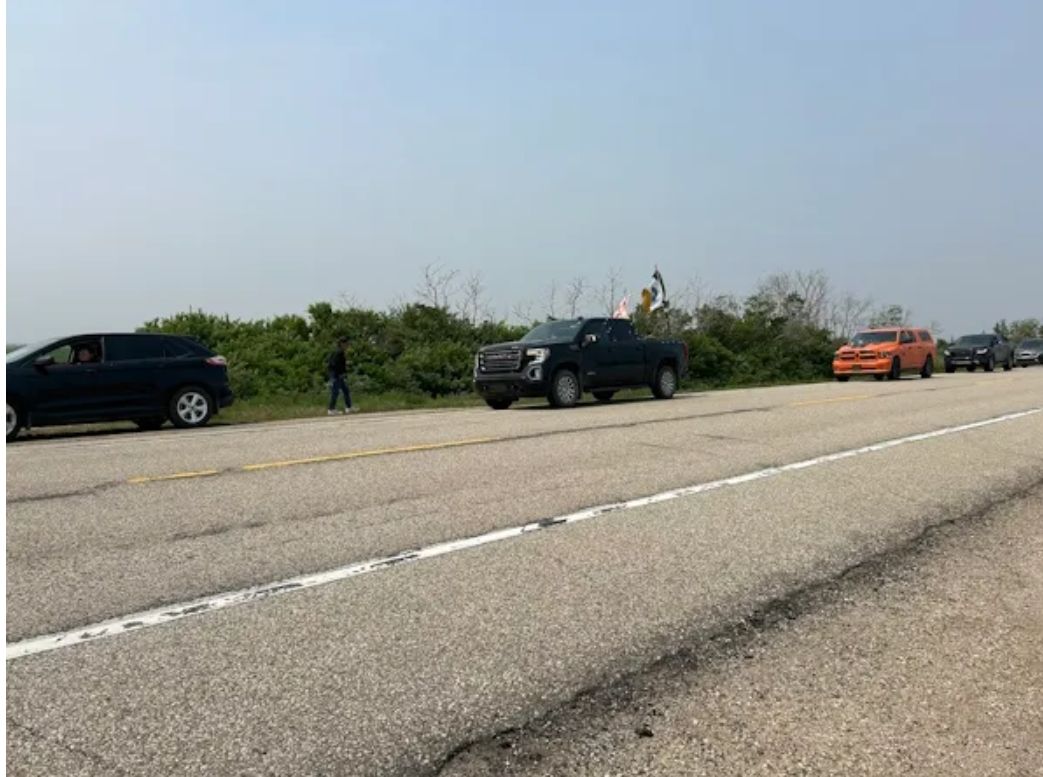 Muskoday First Nations walkers on the way to the Legislature with a ...