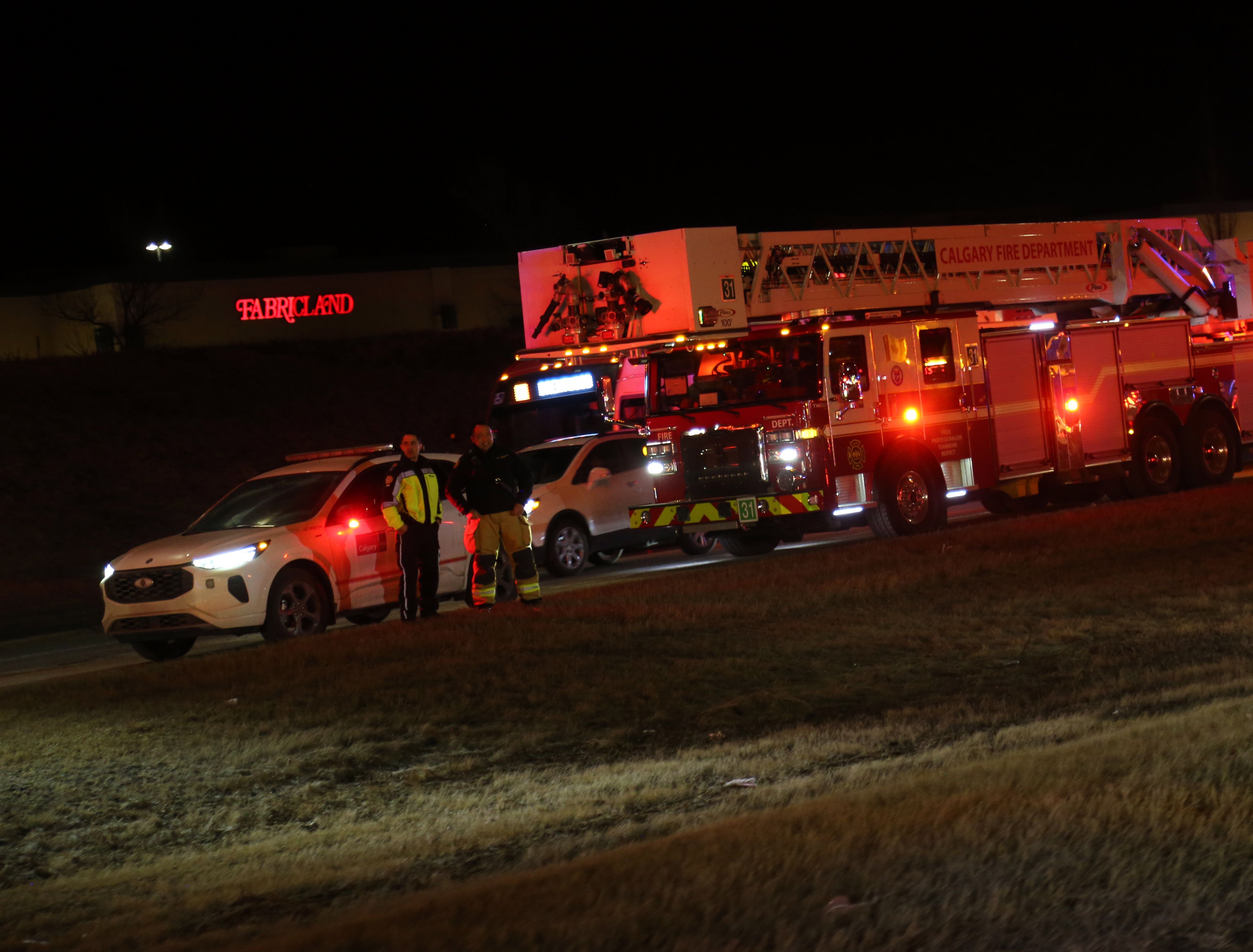 Tow trucks and emergency crews line Calgary roadway with message for ...