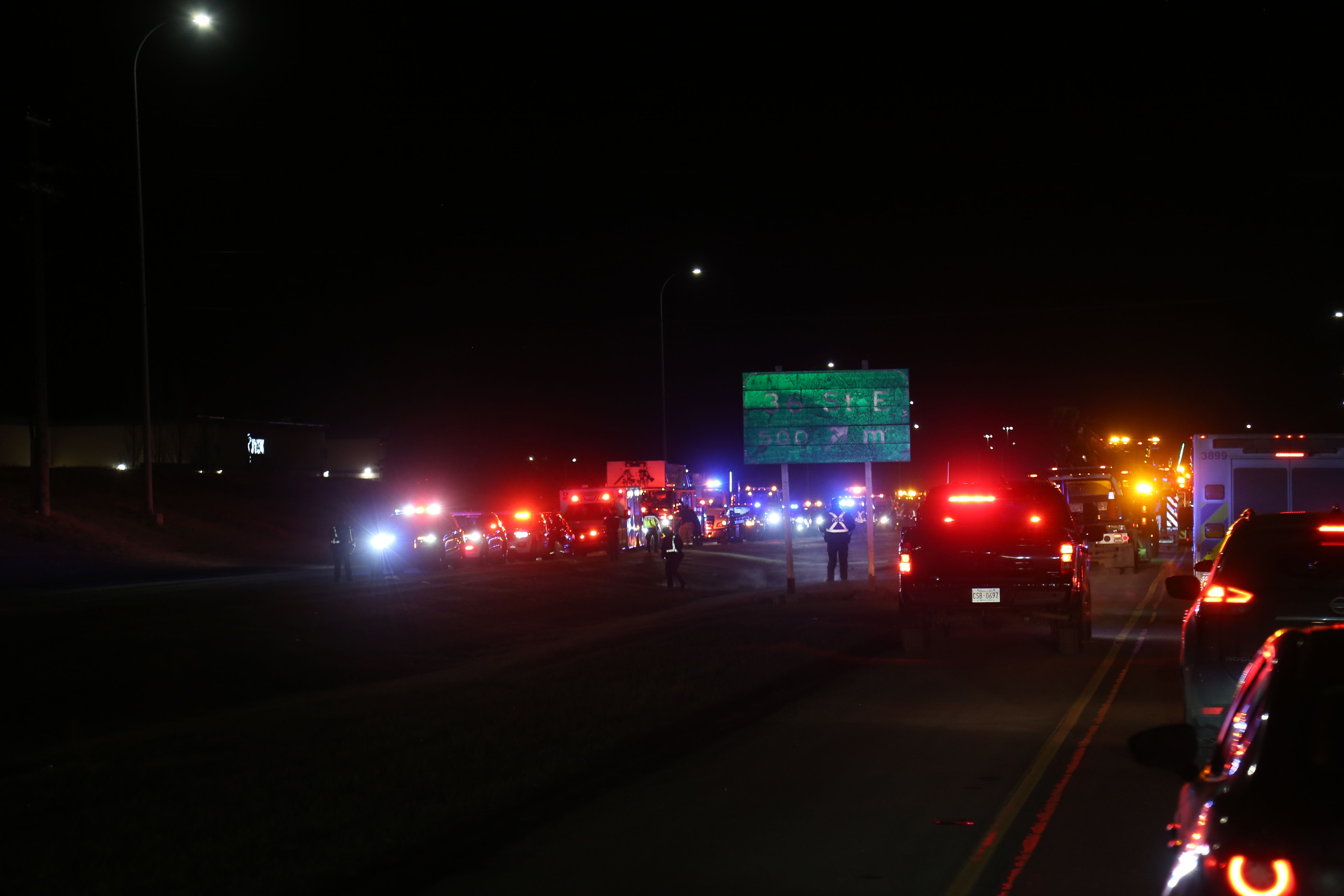 Tow trucks and emergency crews line Calgary roadway with message for ...