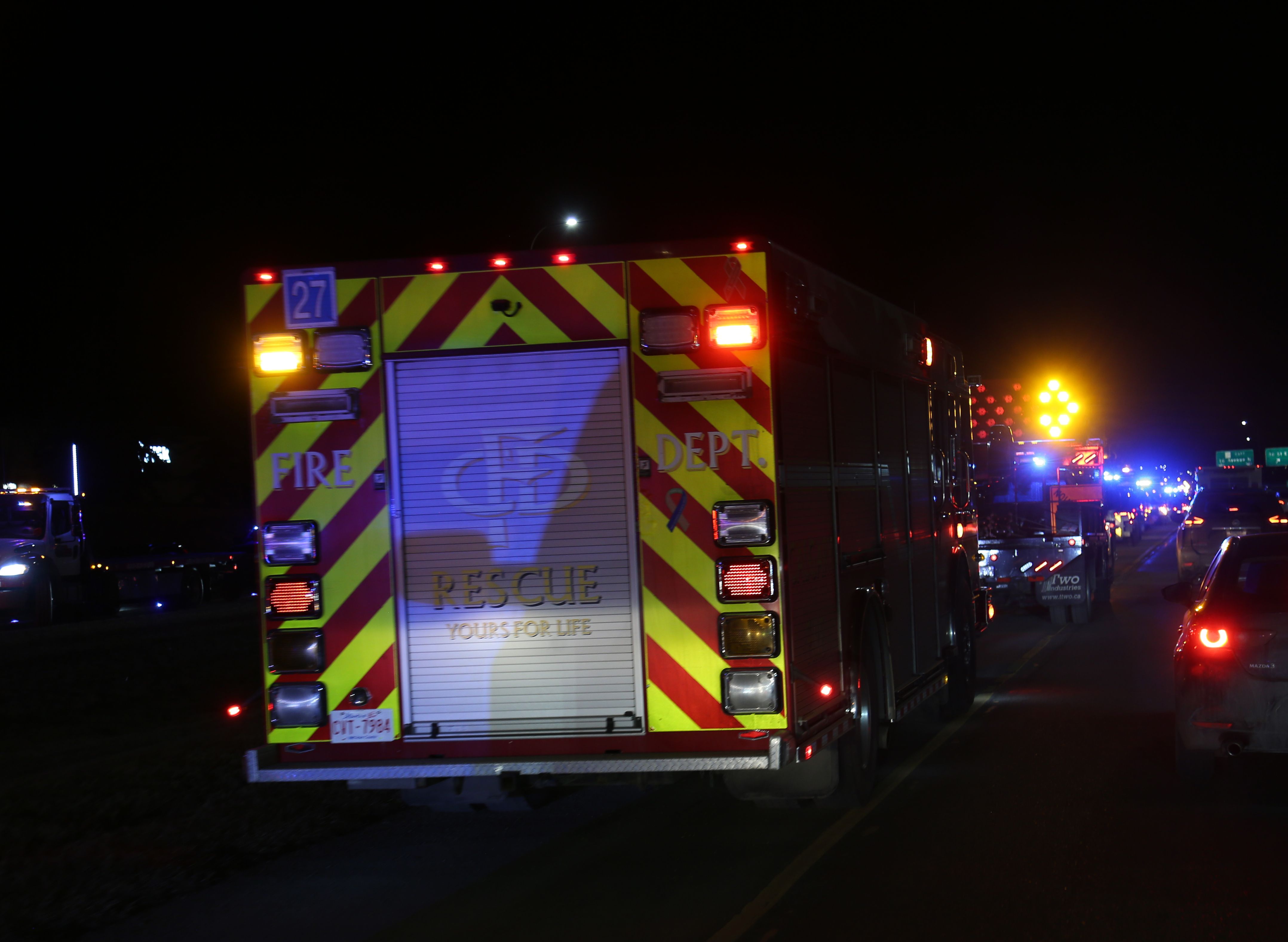 Tow trucks and emergency crews line Calgary roadway with message for ...