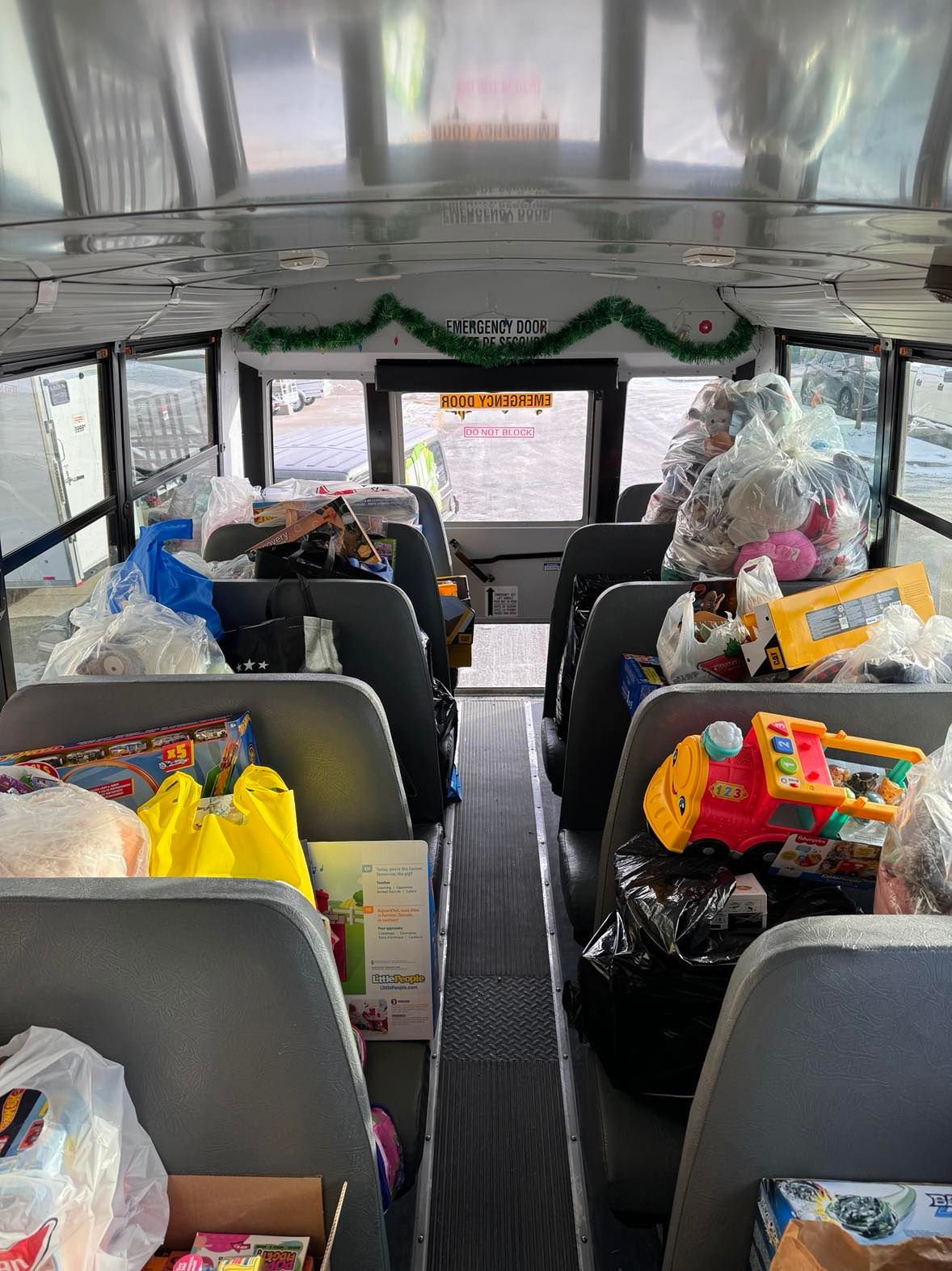 Cochrane's Stuff-A-Bus fills two buses with donated toys and food ...