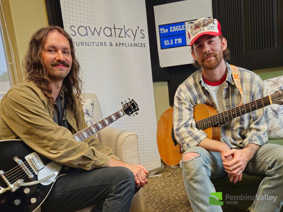 What’s happening inside this red roof barn near Plum Coulee ...