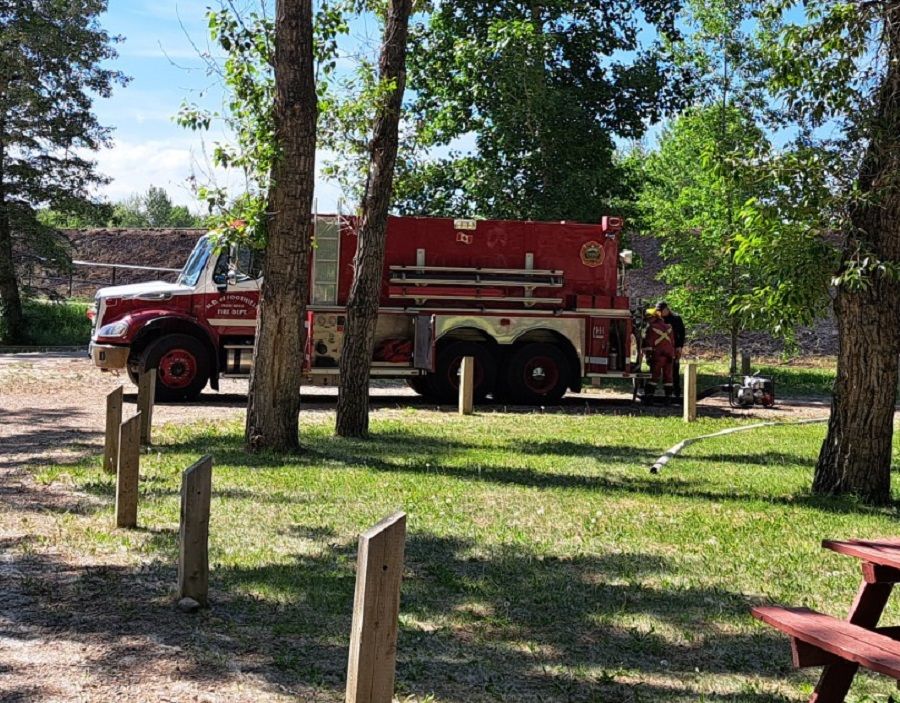 Poplar fluff fire damages berm in George Lane Park - OkotoksOnline.com ...