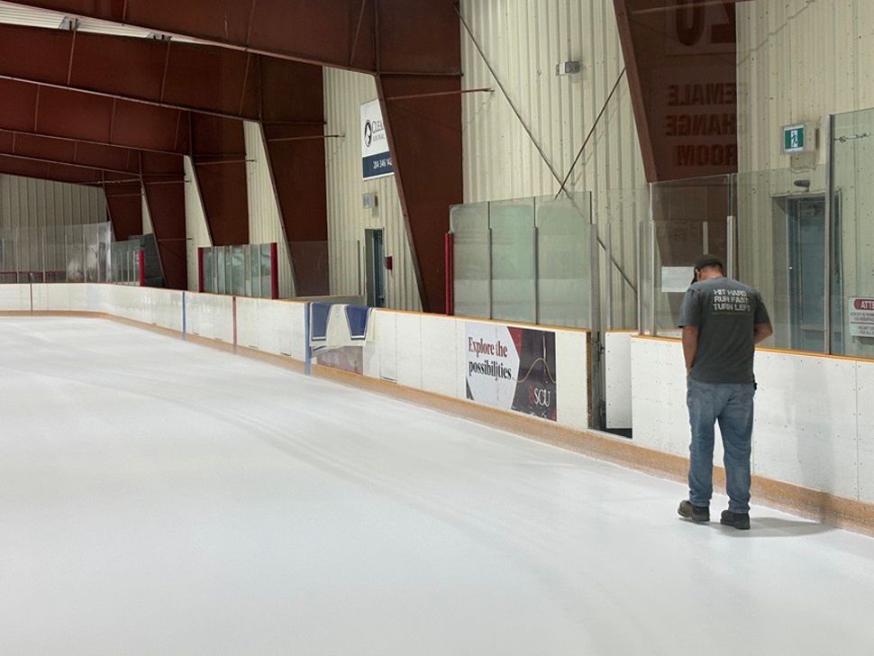 Steinbach's arena staff busy building ice at the TG Smith ...