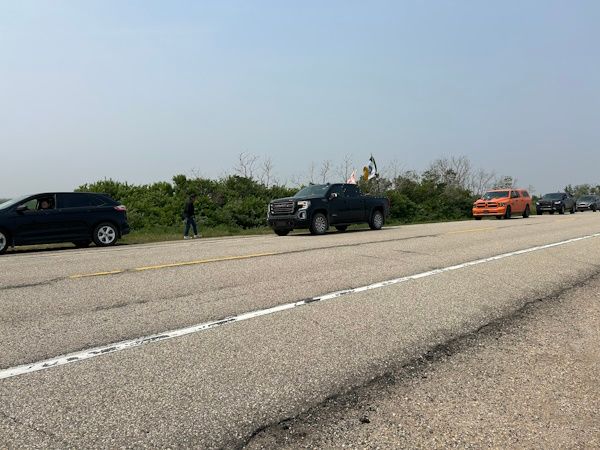 Muskoday First Nations walkers on the way to the Legislature with a ...